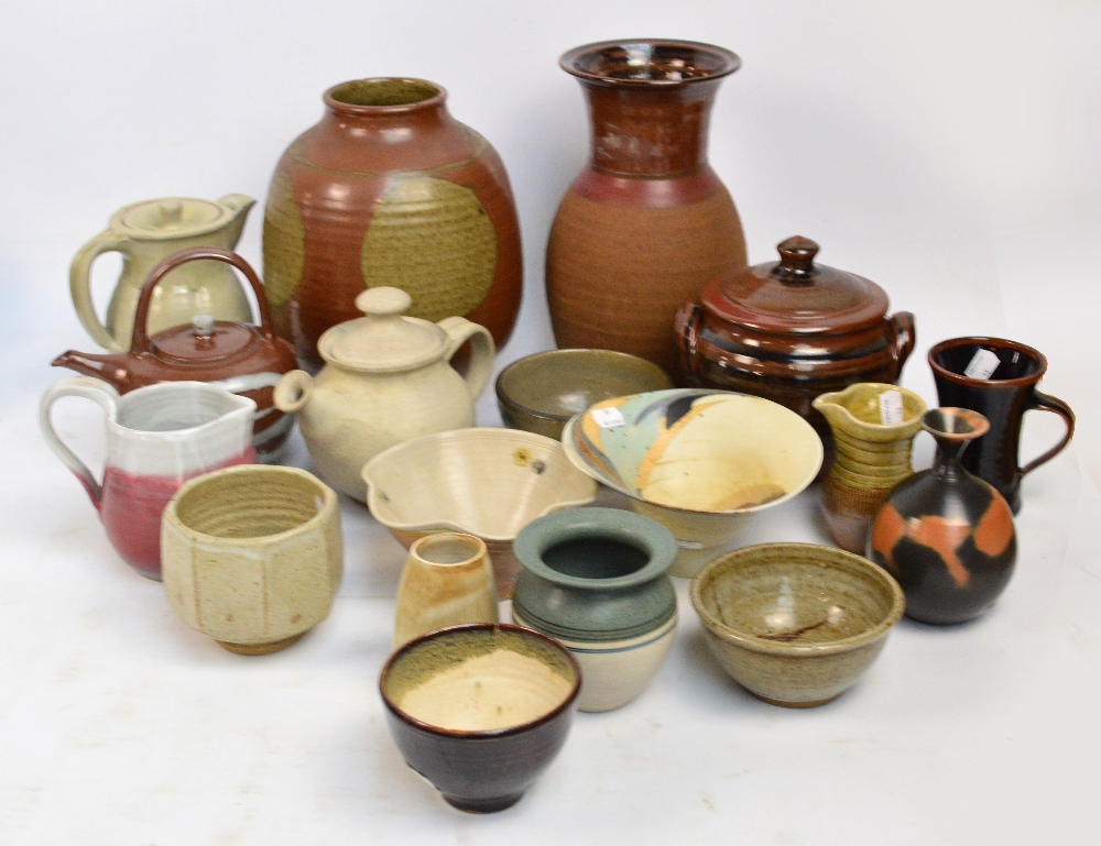 A large group of studio pottery by various makers including Paul Mucham ...