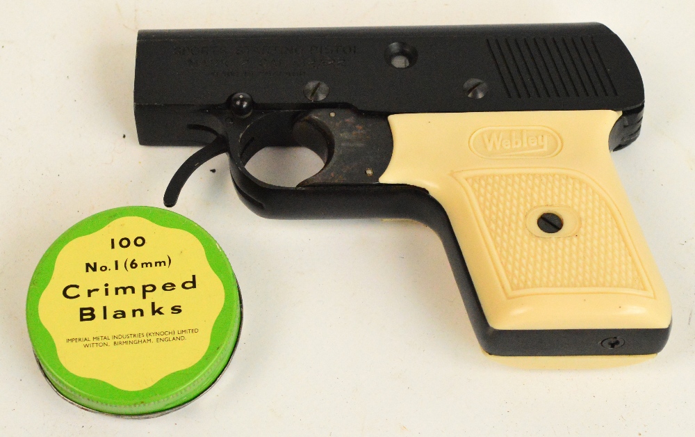 A Webley sporting starting pistol mark 2, with two, six shot magazines ...