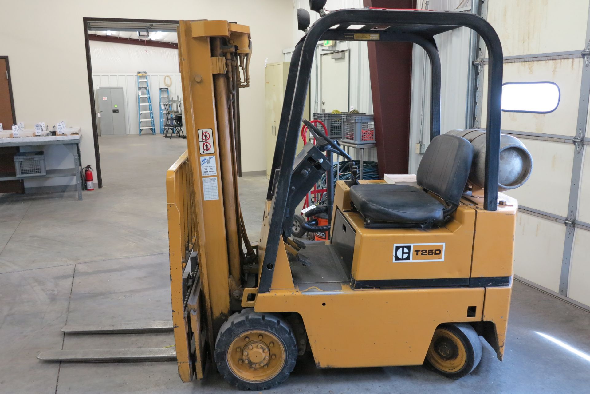 CATERPILLAR, MODEL T25D, 2500 LB CAPACITY, HARD TIRE, LPG, 3 STAGE MAST ...