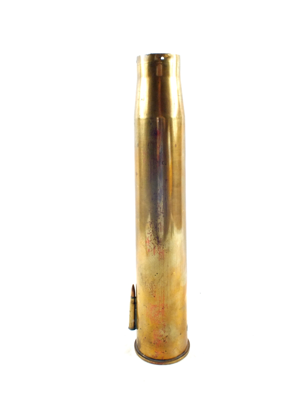 A 6lb shell case with an attached .303 round