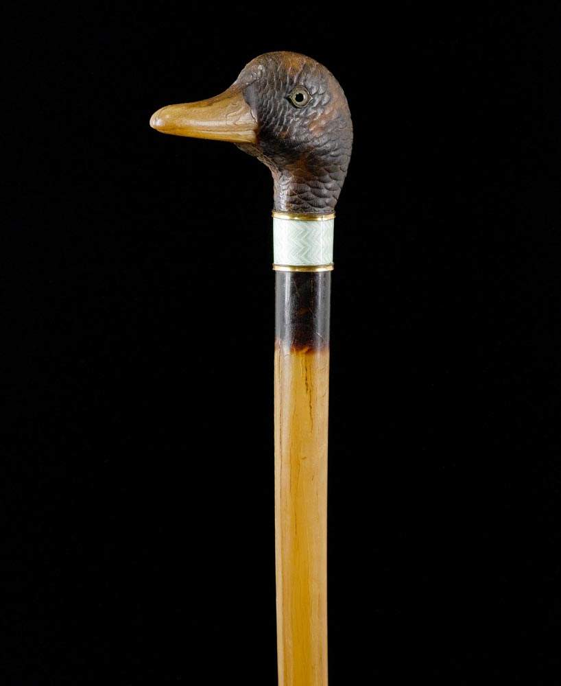 WALKING STICK WITH DUCK'S HEAD,ca. 1900. Two-part grip of rhinoceros ...