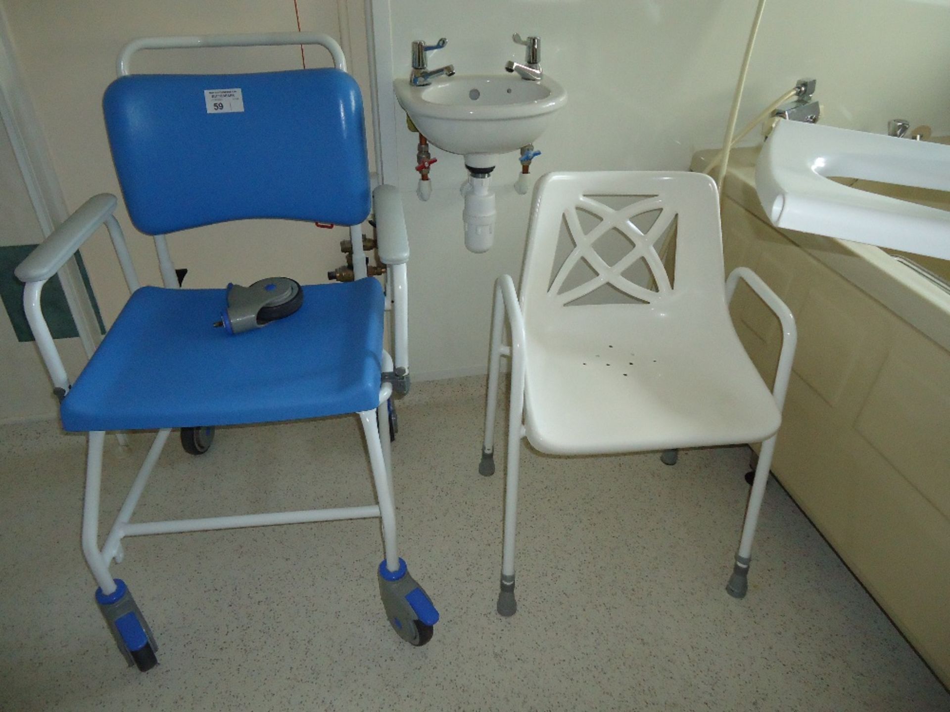 1 Arjo Ambulift manual patient hoist and 2 bathroom patient chairs ...