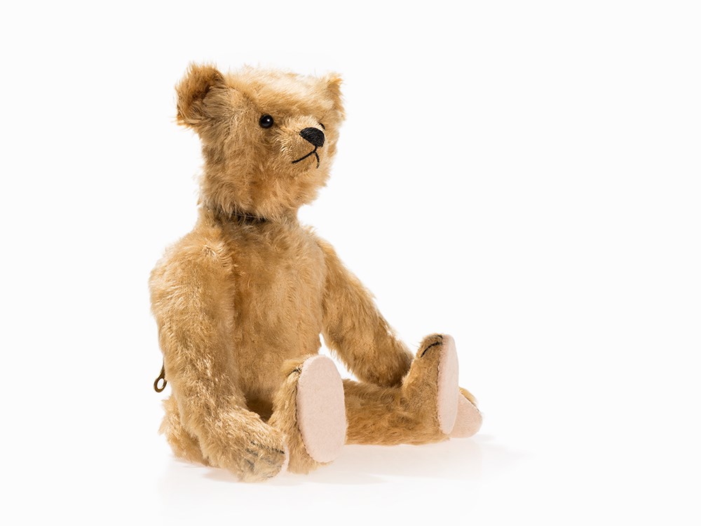 A Bing Teddy Bear with Mechanical Movable Head, circa 1910 Blond mohair ...