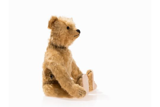 A Bing Teddy Bear with Mechanical Movable Head, circa 1910 Blond mohair ...