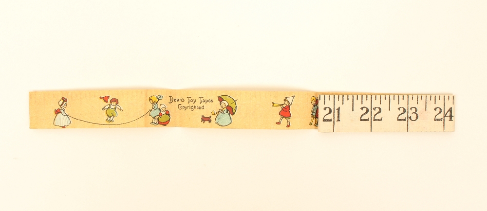 A Dean's rare printed cloth folded 35 3/4 inch tape measure, one side ...