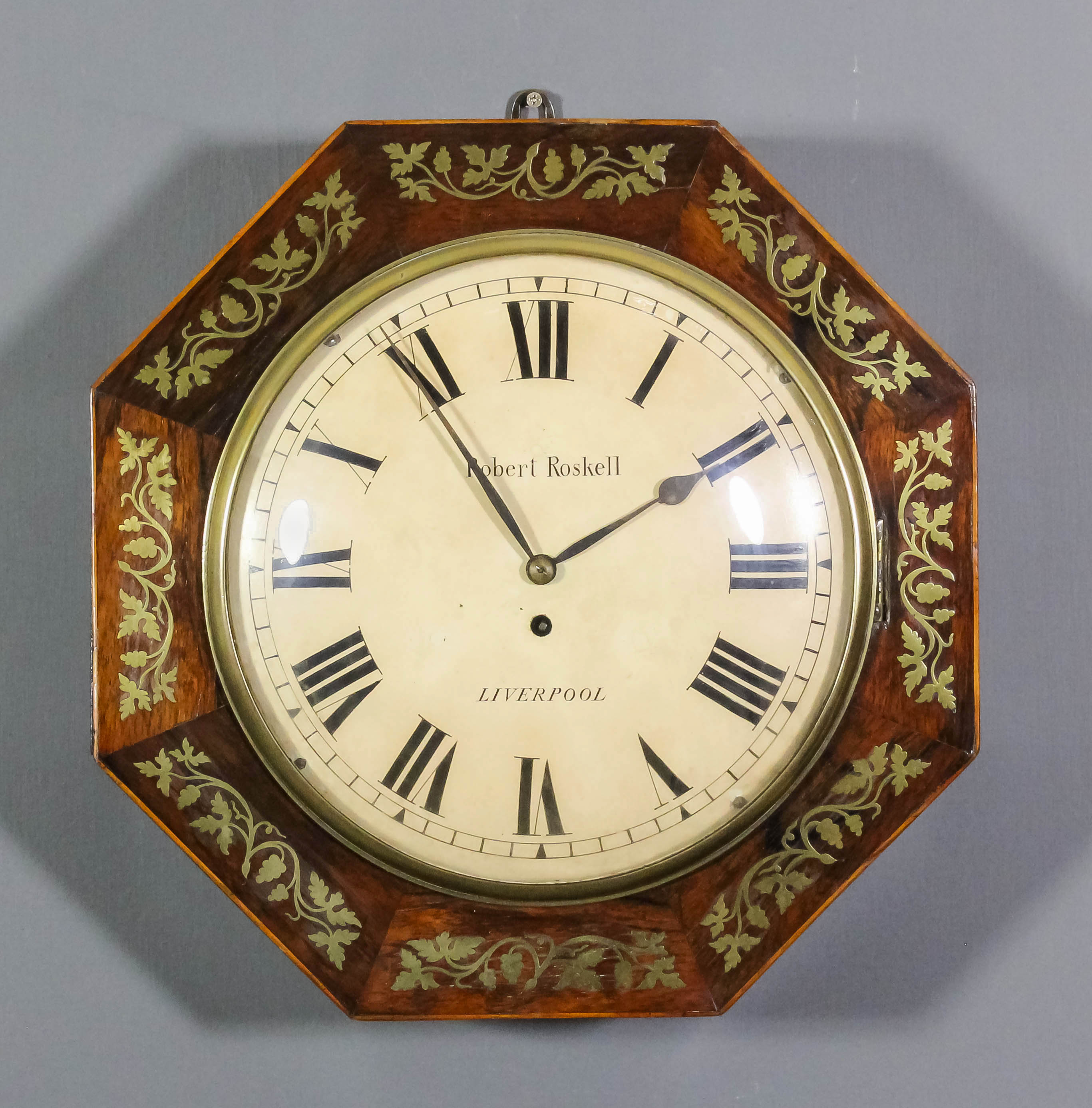 A Regency rosewood octagonal cased dial wall clock by Robert Roskell of ...