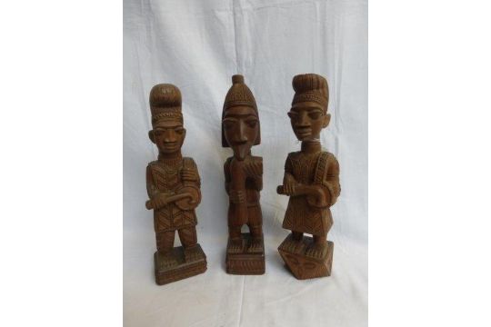 LAMIDI O. FAKEYE (Nigerian 1928 - 2009) - three yoruba mahogany ...