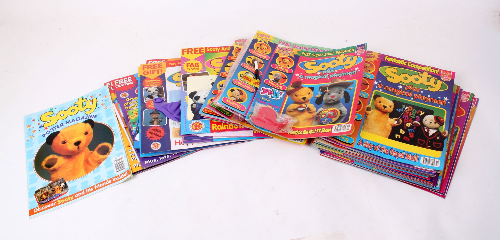 A collection of vintage Sooty toys and ephemera, including a large ...