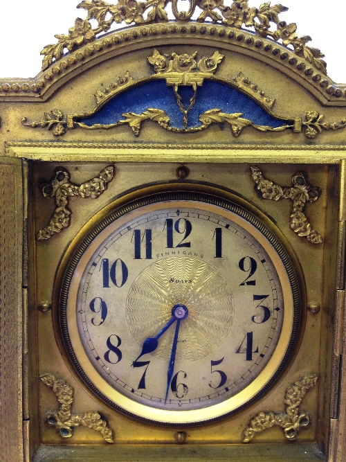 An early 20th century 8 day brass framed bedside clock by Finnegans ...
