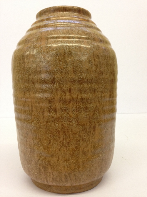 A Poole Pottery Sylvan ware ribbed vase decorated in a mottled brown ...