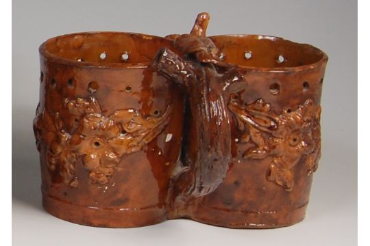 An Edward Bingham Castle Hedingham Pottery double puzzle mug, the ...