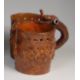 An Edward Bingham Castle Hedingham Pottery double puzzle mug, the ...