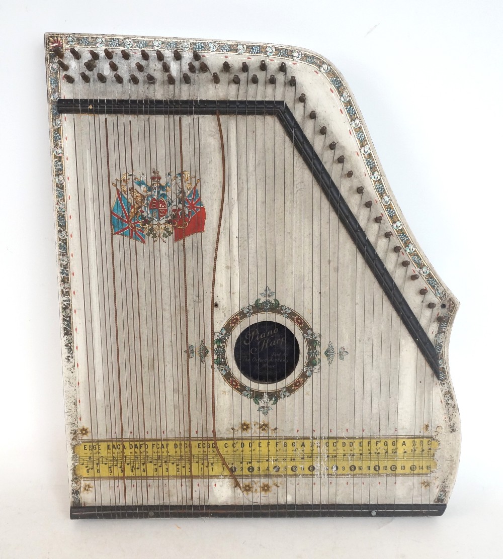 ROYAL PIANO HARP with a shaped and decorated wooden body bearing the ...