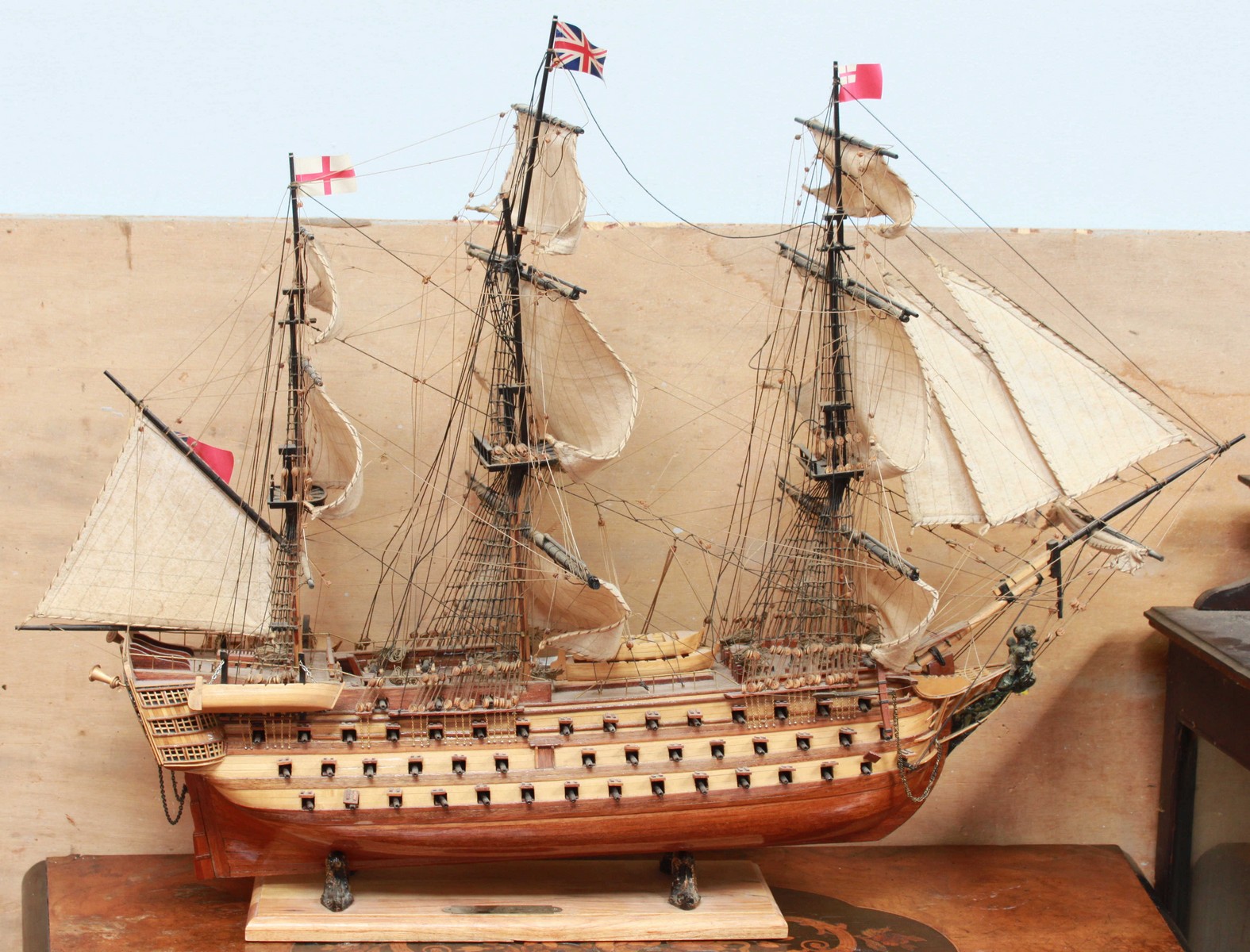 Maritime. A large model sailing ship of HMS Victory in full sail, on a ...