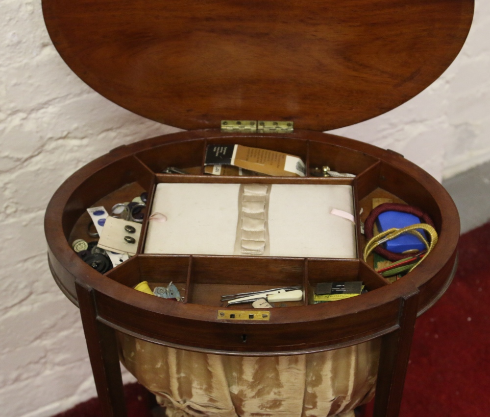 A Edwardian sewing box raised on slender carved legs with contents of ...