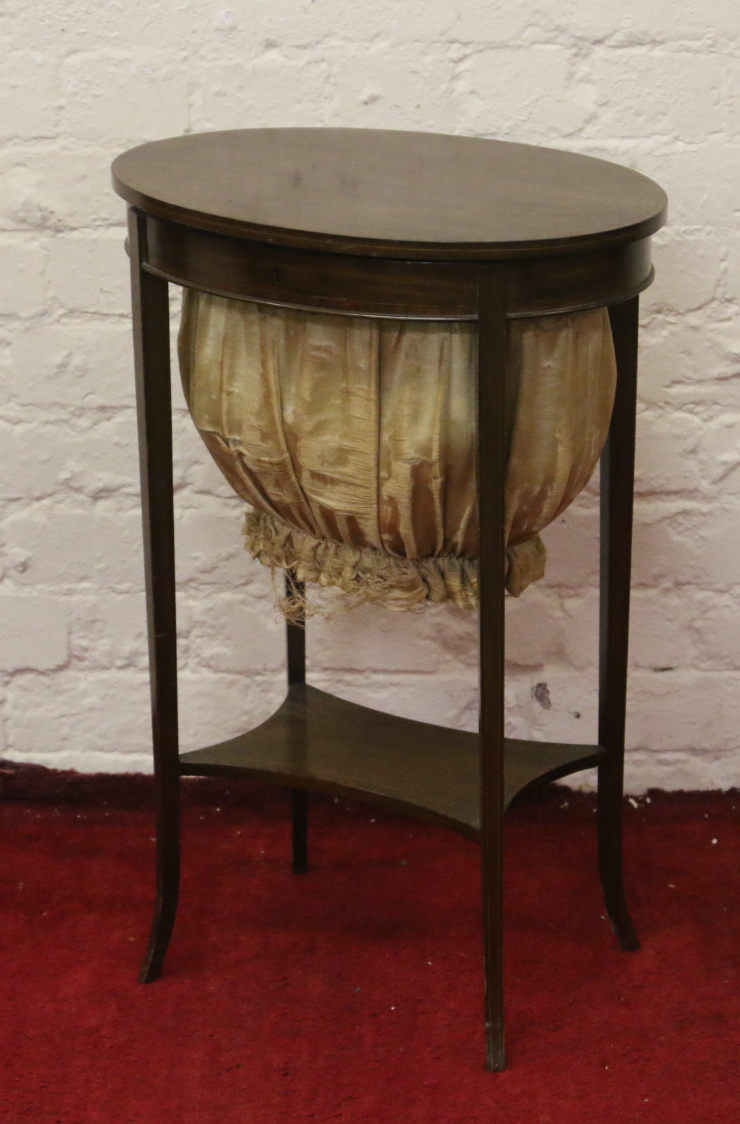 A Edwardian sewing box raised on slender carved legs with contents of ...