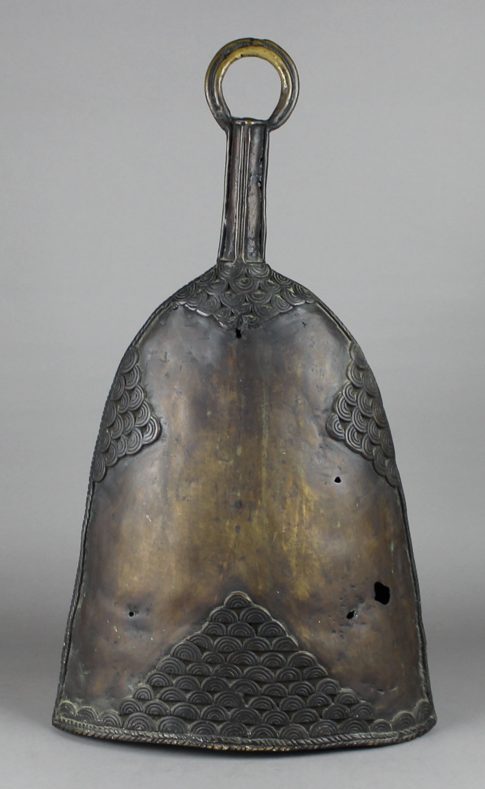 AN 18TH/19TH CENTURY BENIN DARK BROWN PATINATED BRONZE OVAL BELL, cast ...