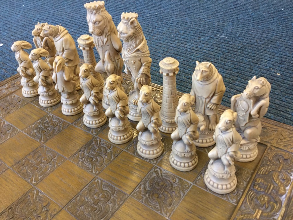 A composition 'Reynard the Fox' chess set, with moulded figural prices ...