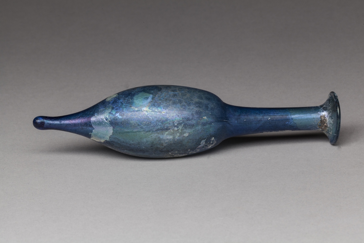 LACRYMATORY. Blue glass. 1st century A.D. LACRYMATOIRE. Verre bleu ...