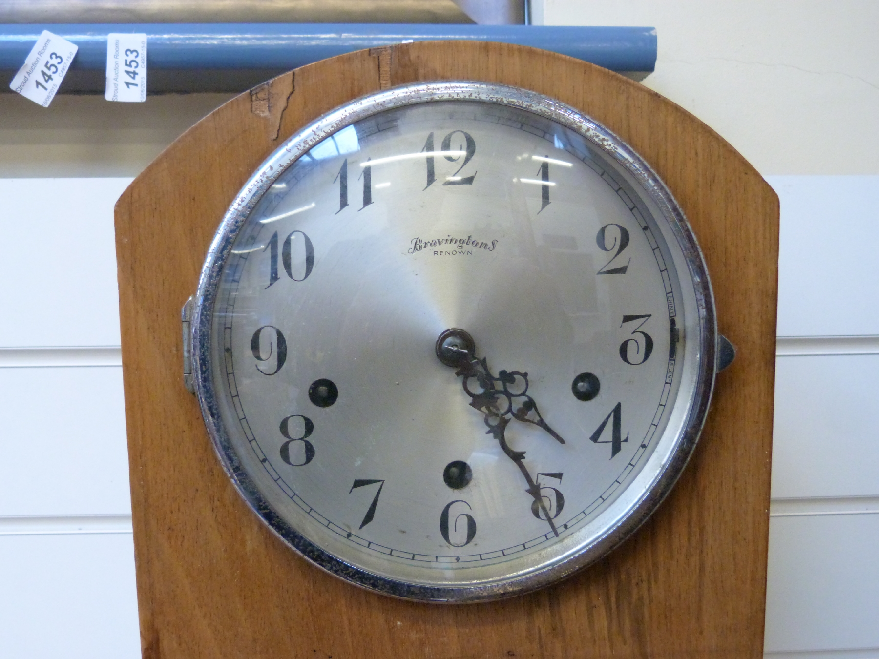 A Bravington's Ltd walnut cased Westminster chime grandmother clock