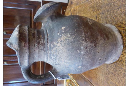 A Terracotta Watering Can, 16th century, of baluster form with pierced ...