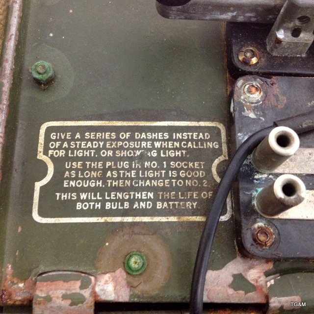 A WW2 British Military signal lamp and morse code box with instructions ...