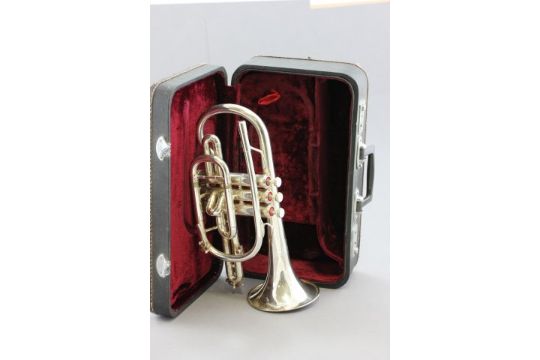 A Cased Lark M4046 Silver Cornet including a Besson 7 mouth piece