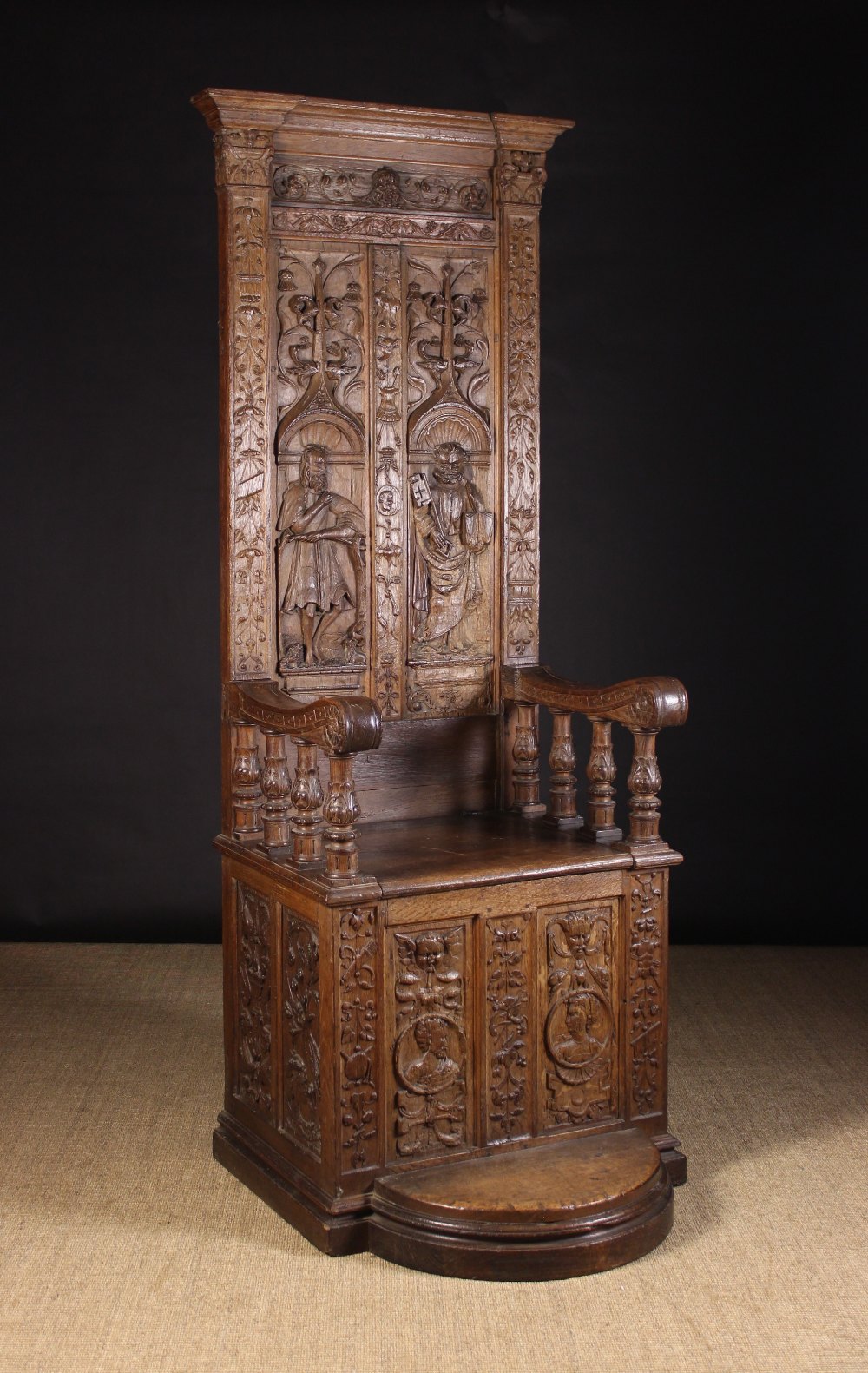 A Carved 16th Century Renaissance Throne Chair. The tall twin panel ...