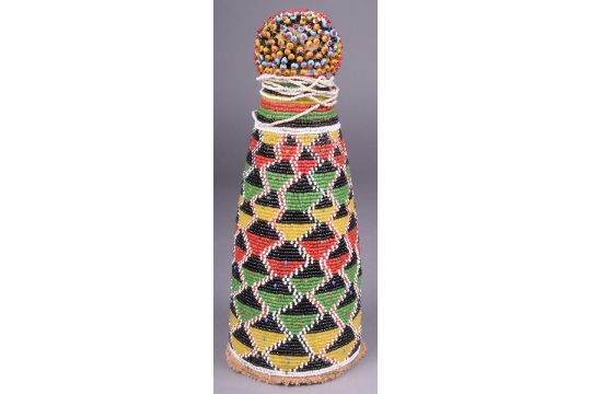 A Sotho beadwork doll, South Africa, with a wooden core and cloth ...