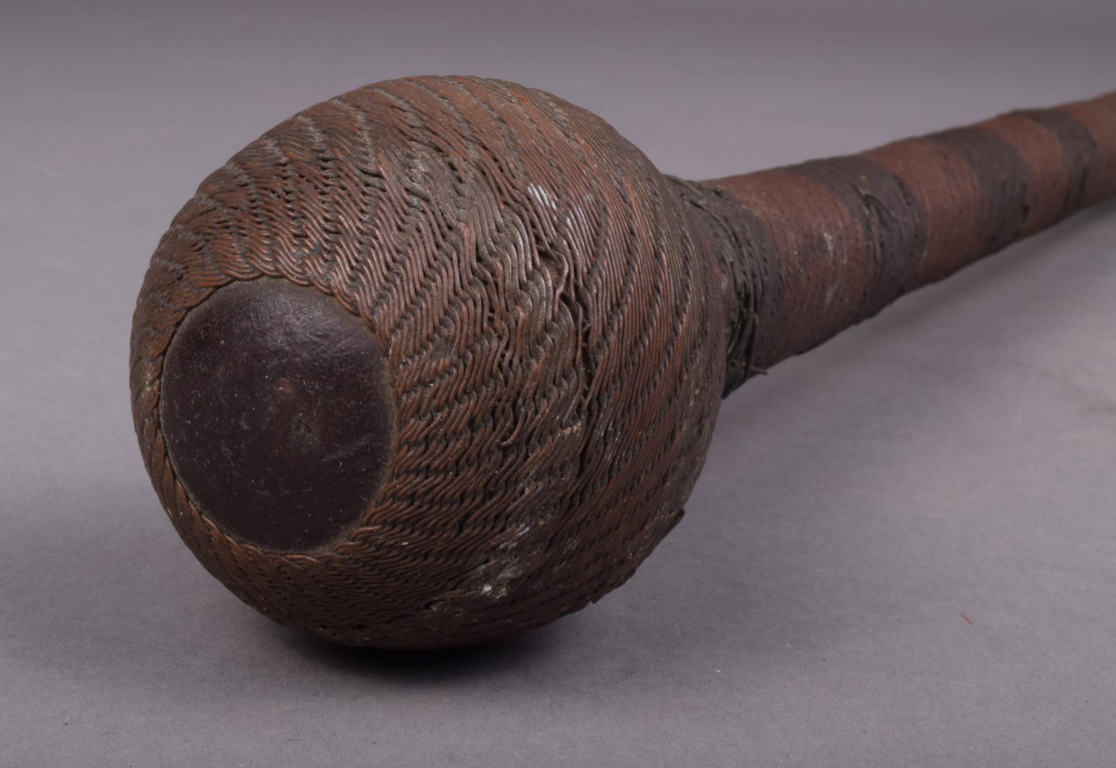 A Zulu knobkerrie, South Africa, wood with a spherical head and with ...