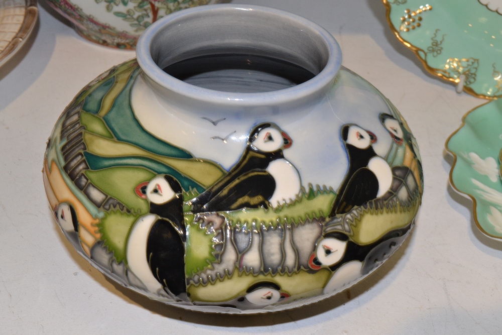 A Moorcroft pottery Puffins pattern squat baluster shaped vase, green ...