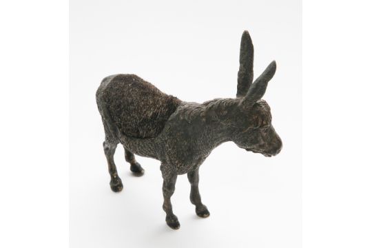 Late Victorian bronze pen wipe modelled as a donkey, the back inset ...
