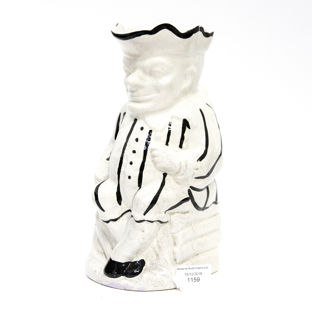 A mid Victorian Toby jug of 'Mr Punch' 1850-60 with monochrome colour