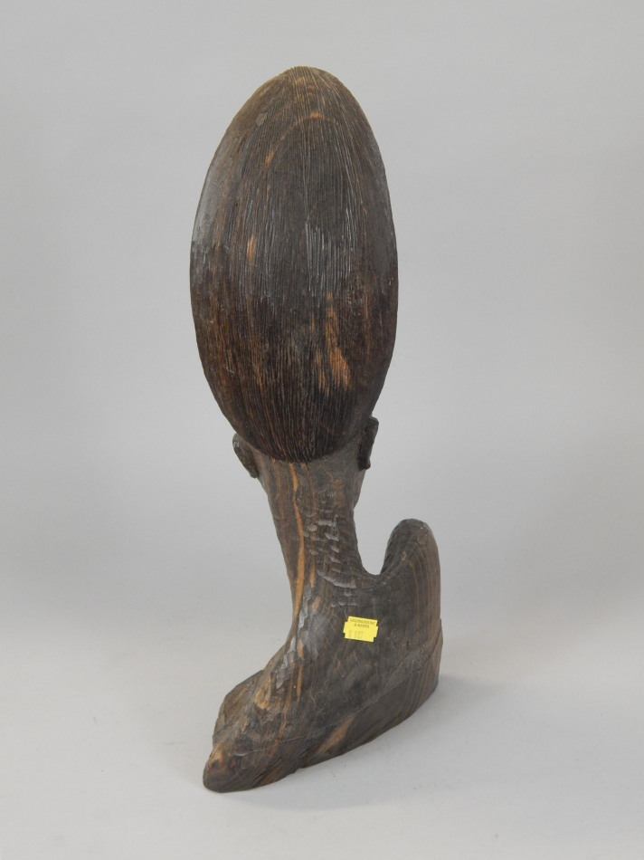 Felix Idubor (Nigerian 1928-1991). An African tribal carved hardwood ...
