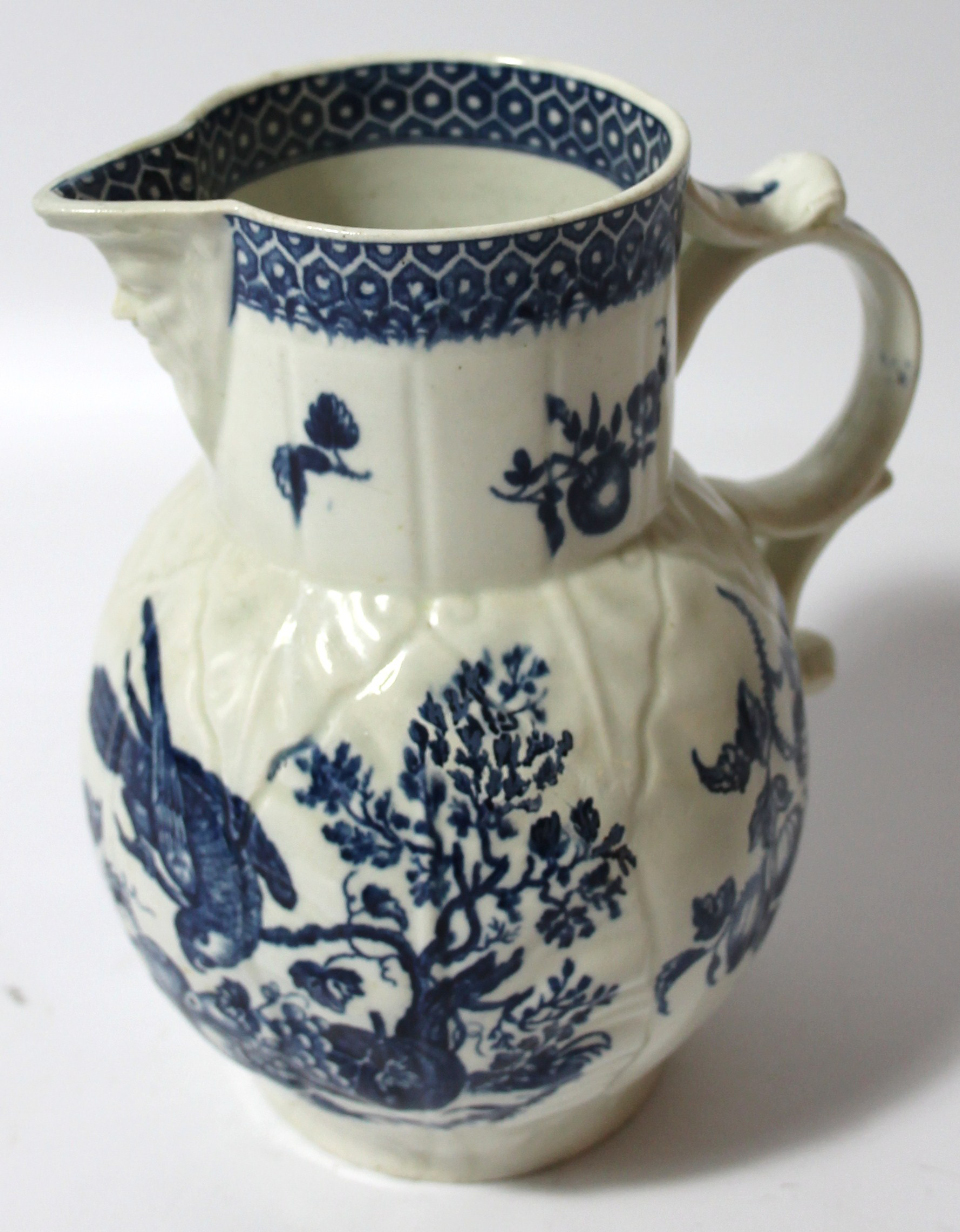 A late 18thC Caughley porcelain cabbage leaf jug, with satyr mask head ...