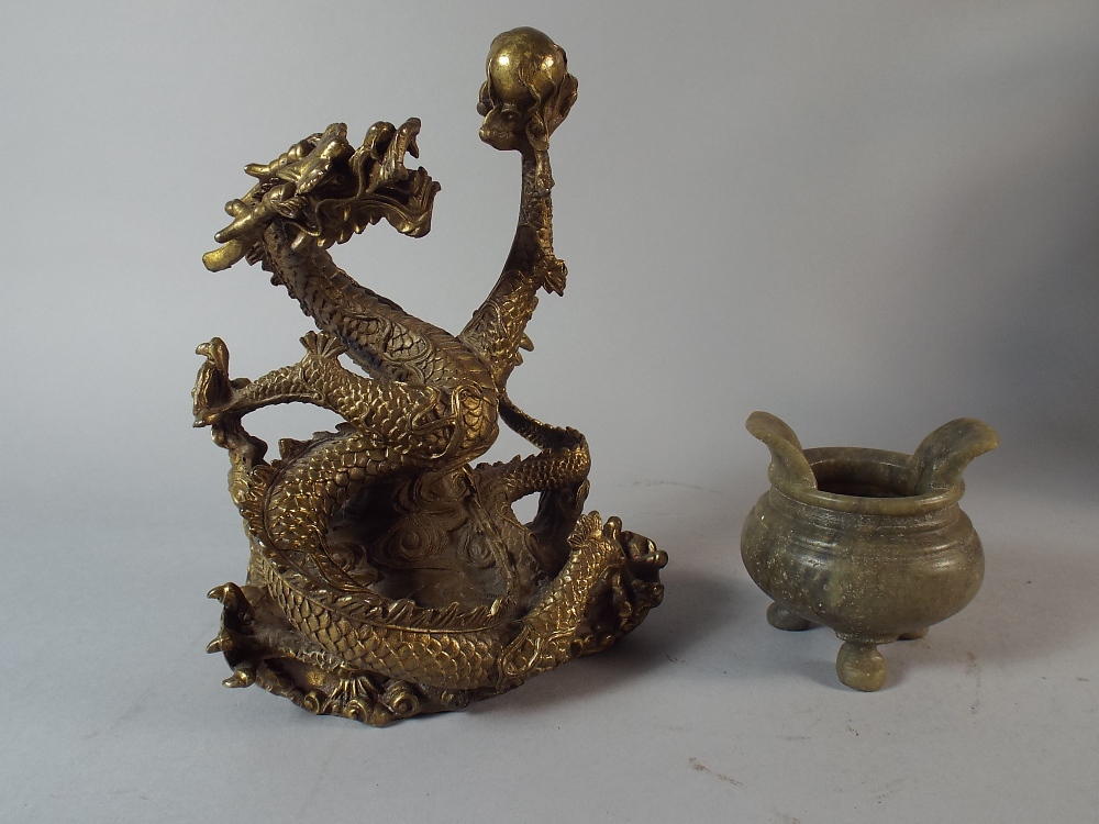 A Chinese Bronze Figure of an Imperial Five Toed Dragon. 18cm High, and ...