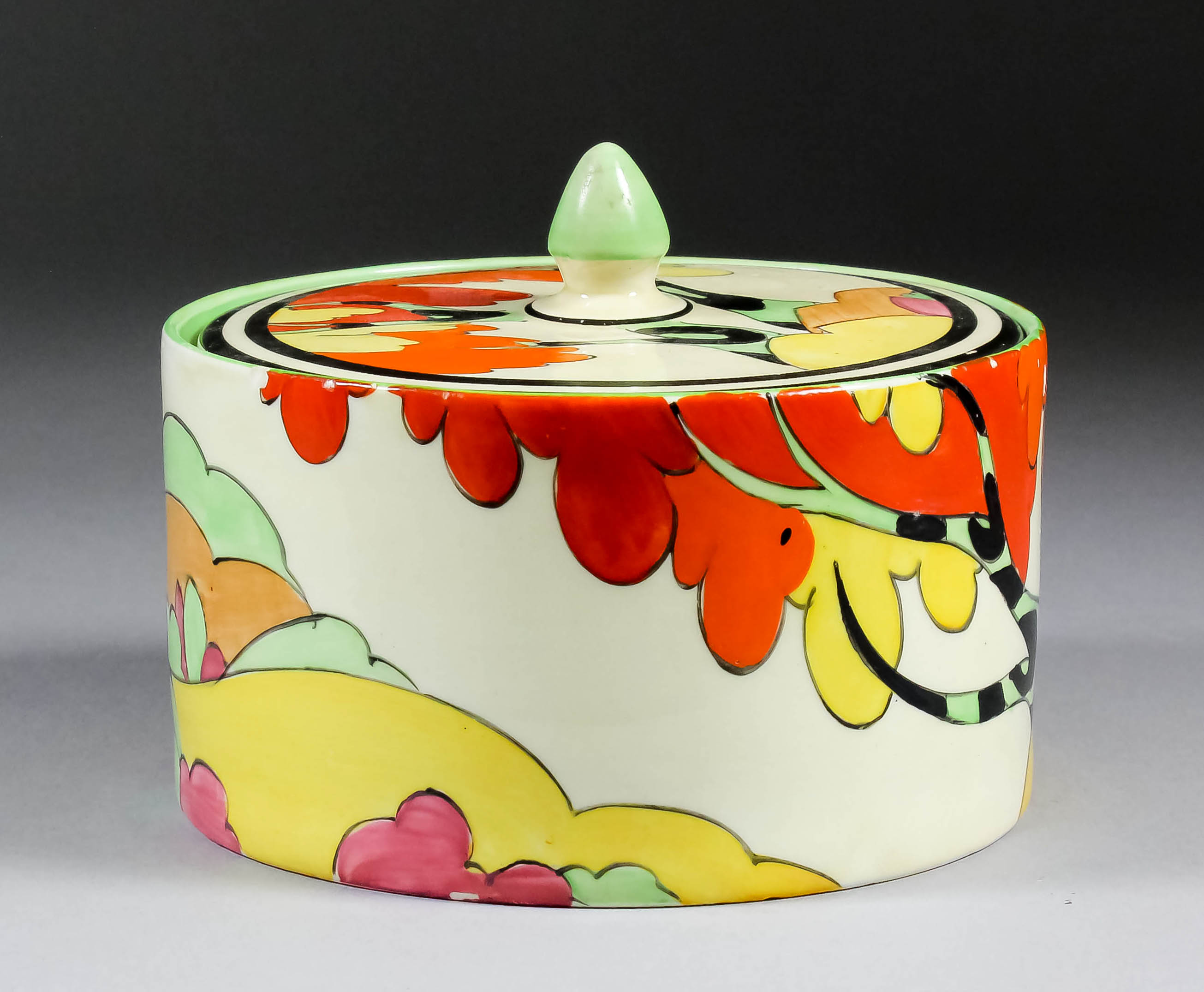 A Clarice Cliff "Fantasque Bizarre" pottery cylindrical bowl and cover ...