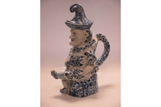 A faience character jug depicting Mr. Punch