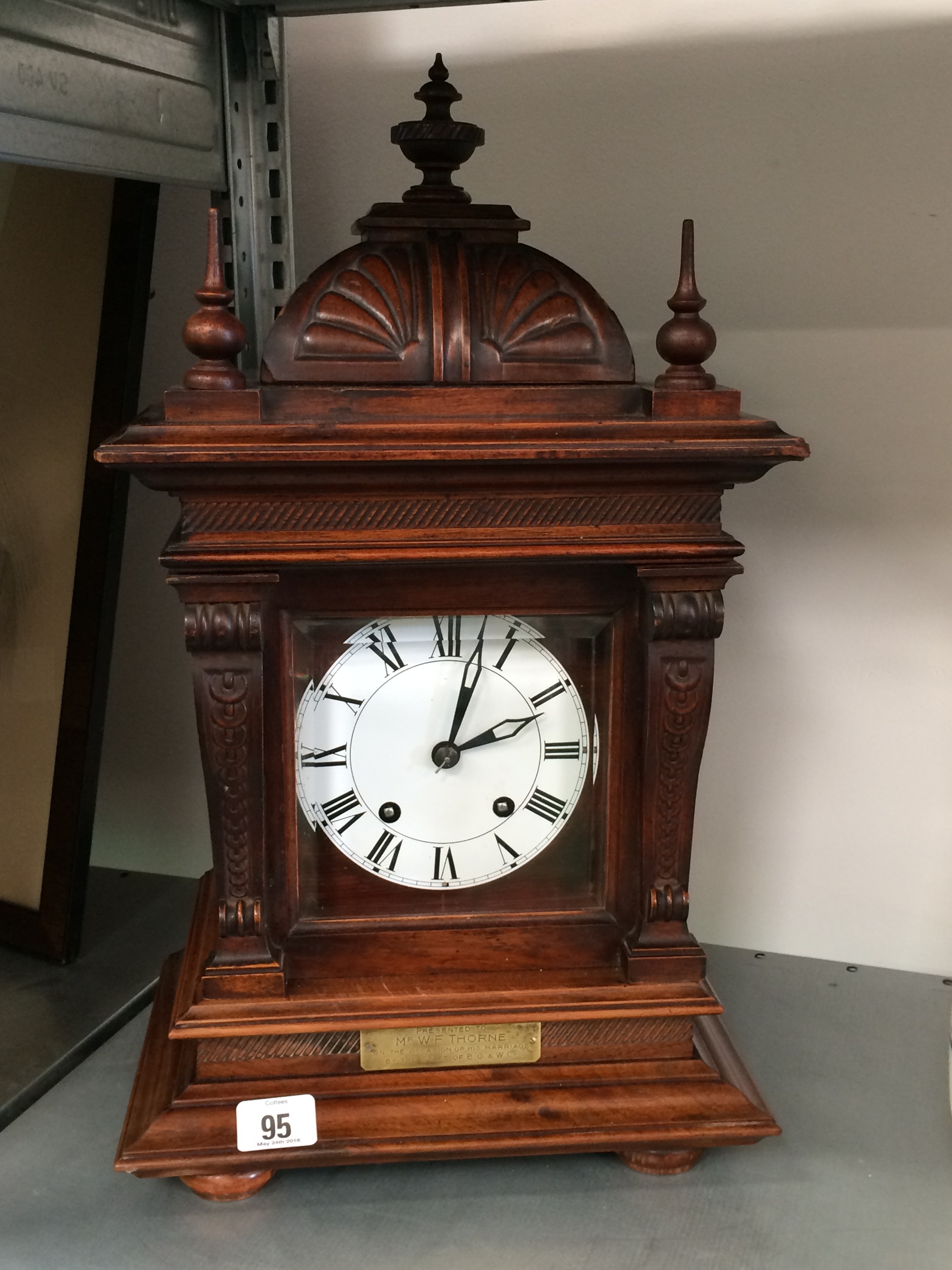 An oak cased mantle clock retailed by Bravingtons Limited, Kings Cross ...