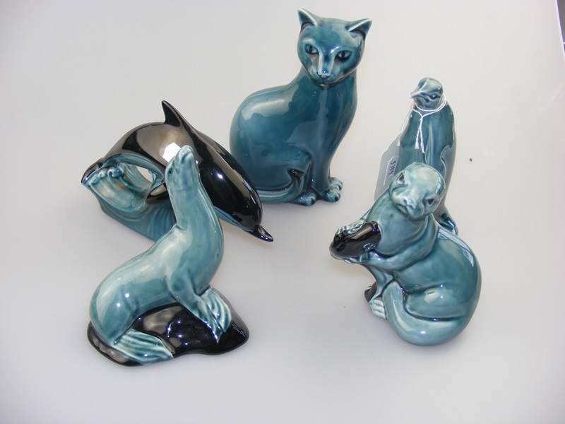 Five blue glazed Poole pottery animals