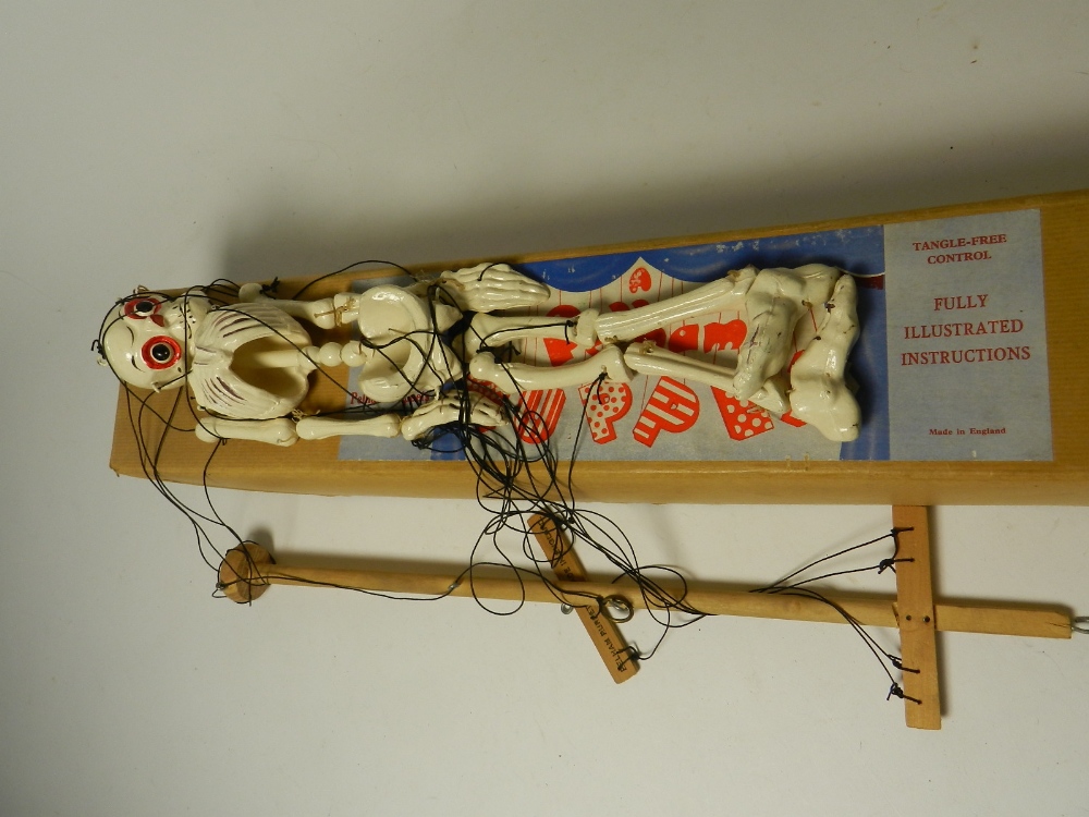 A Pelham Puppets Skeleton in original brown cardboard box with original ...