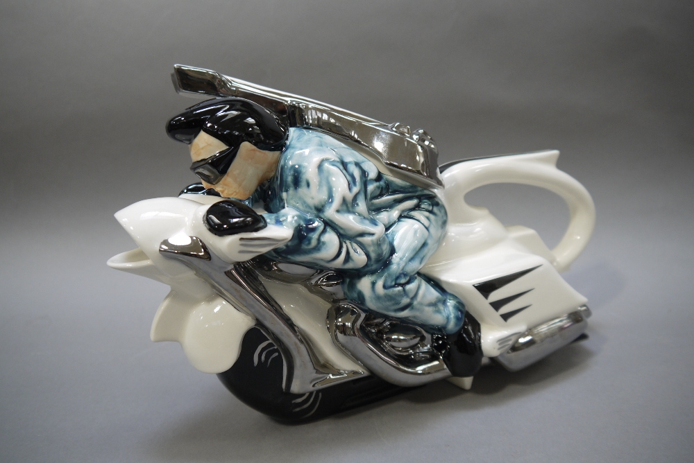 A Silver Crane company teapot in the form of a motorbike, Elvis riding ...