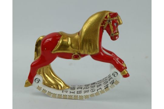 Minton gilded rocking horse from the Alex Hooper studio, signed to base ...
