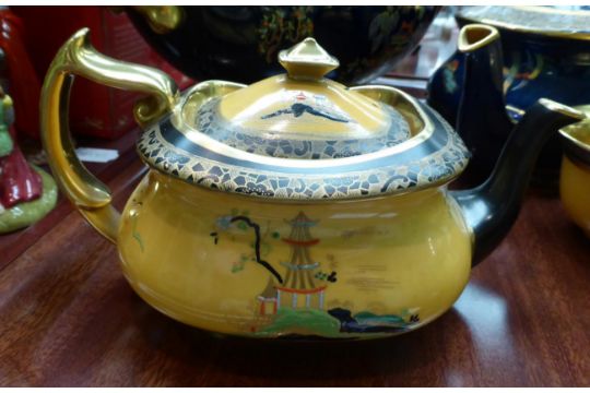 A 1930s Carlton ware three piece tea set in the Temple pattern together ...