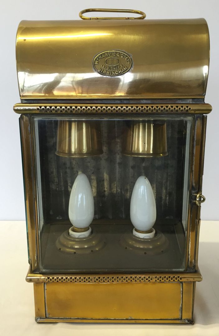 An antique brass ships double light lantern by Wm. Harvie & Co Ltd ...