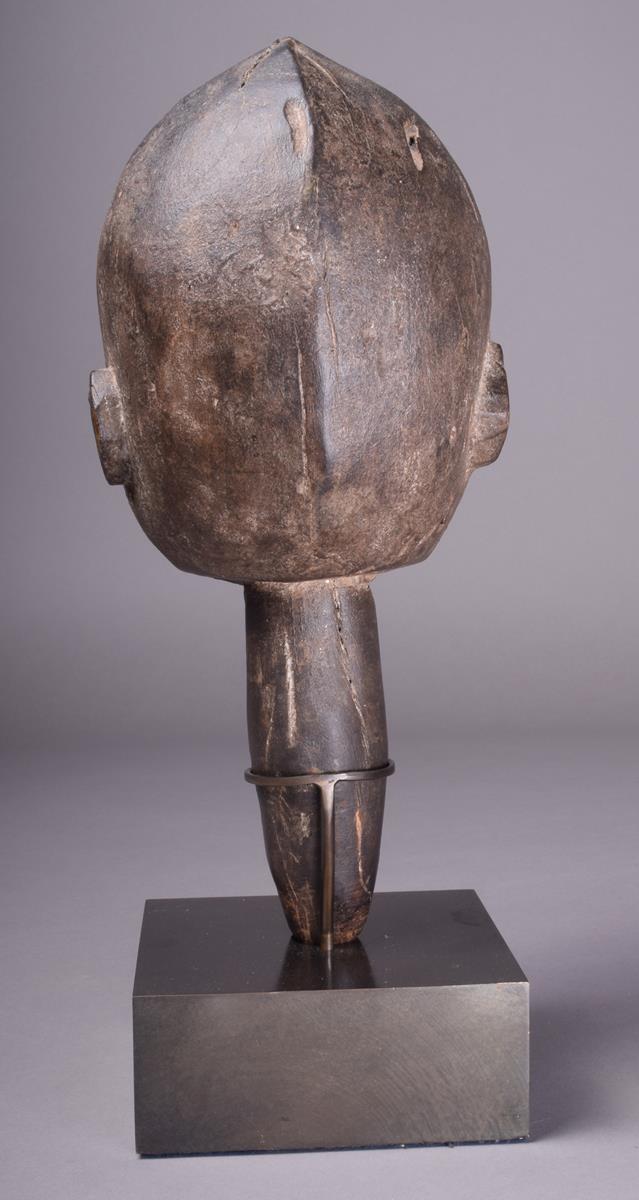 A Lobi head Burkina Faso with a medial ridge almond shape eyes and ...