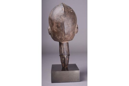A Lobi head Burkina Faso with a medial ridge almond shape eyes and ...