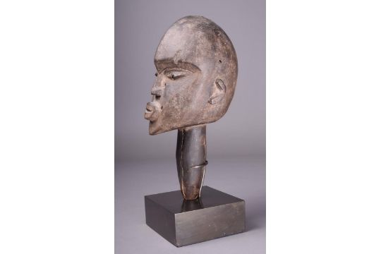 A Lobi head Burkina Faso with a medial ridge almond shape eyes and ...