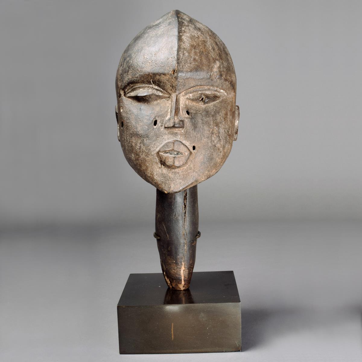 A Lobi head Burkina Faso with a medial ridge almond shape eyes and ...