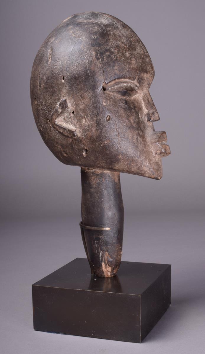 A Lobi head Burkina Faso with a medial ridge almond shape eyes and ...